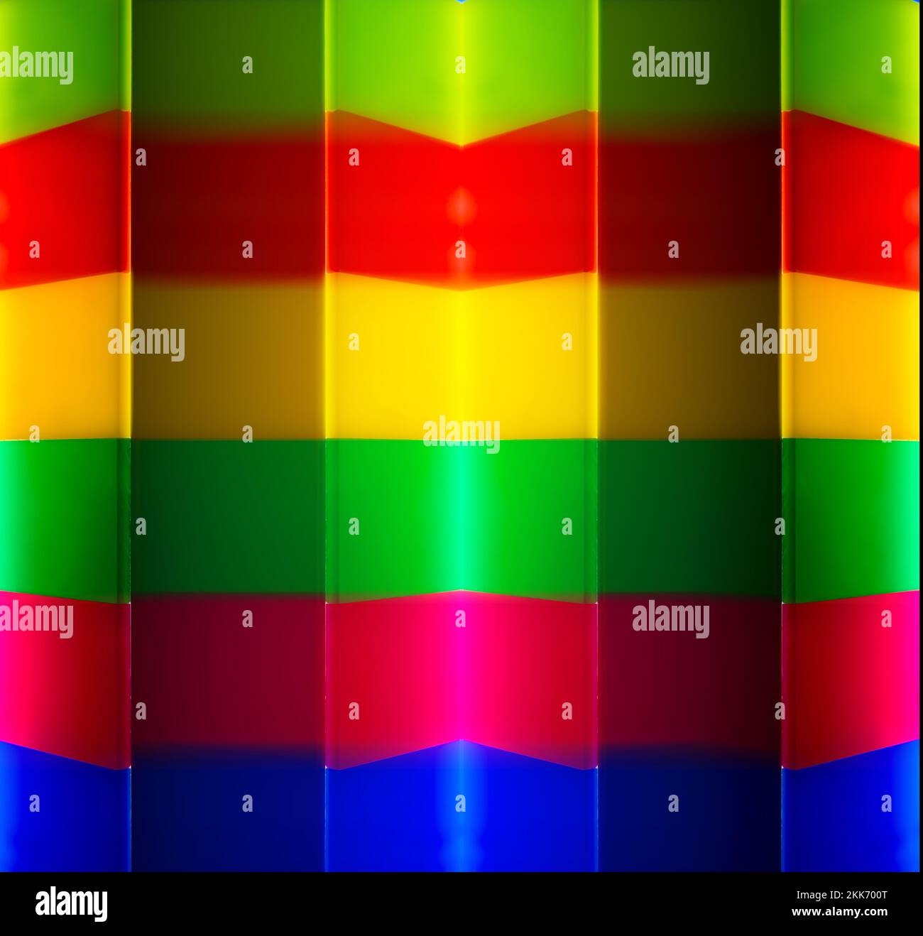 color plastic shape plexiglas backlit with LEDs on balck background ...