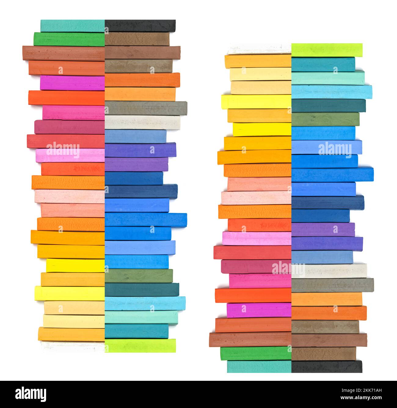 Hard chalk pastels arranged as rainbow spectrum on white background ...