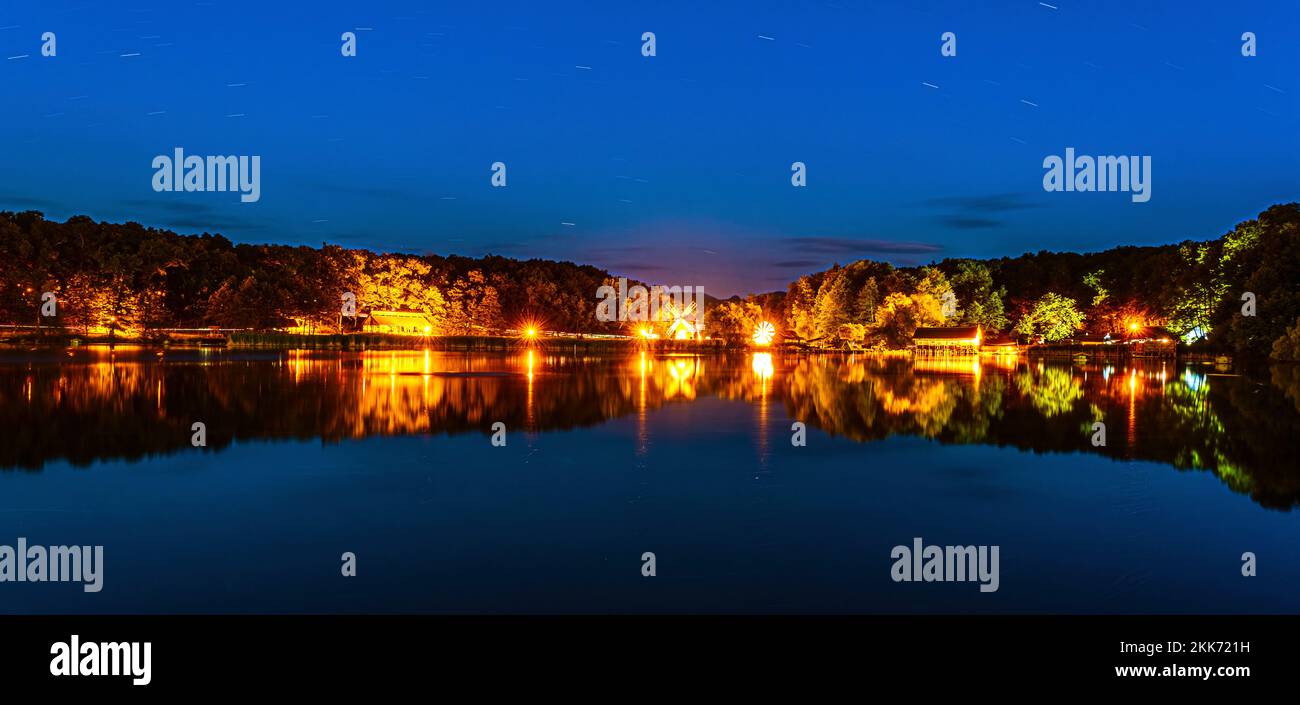 Landscape panorama with windmills at the blue hour Stock Photo - Alamy