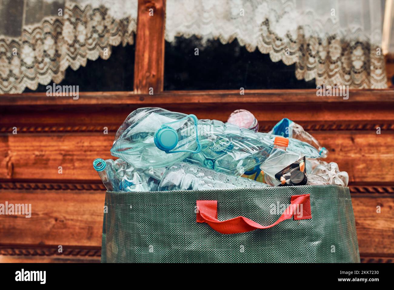 Plastic bottles collected in big container. Heap of plastic bottles ...