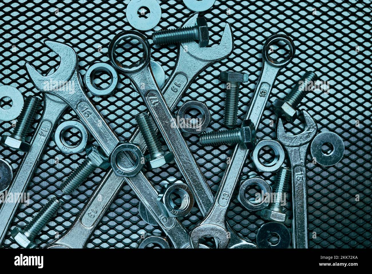 Set of chrome wrenches on steel surface. Mechanic tools for maintenance ...