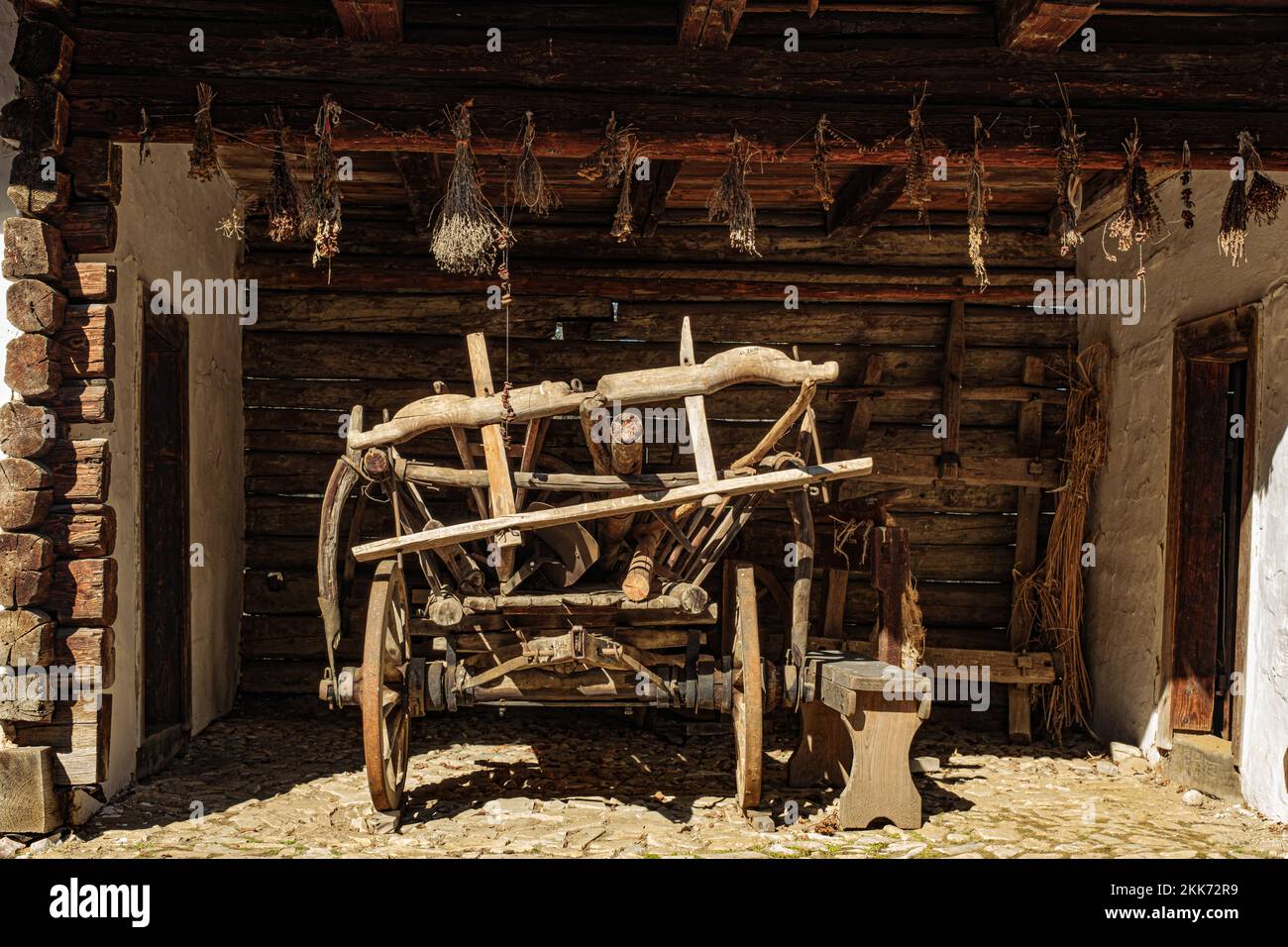 old Romanian carriage with rusty wheels Stock Photo - Alamy