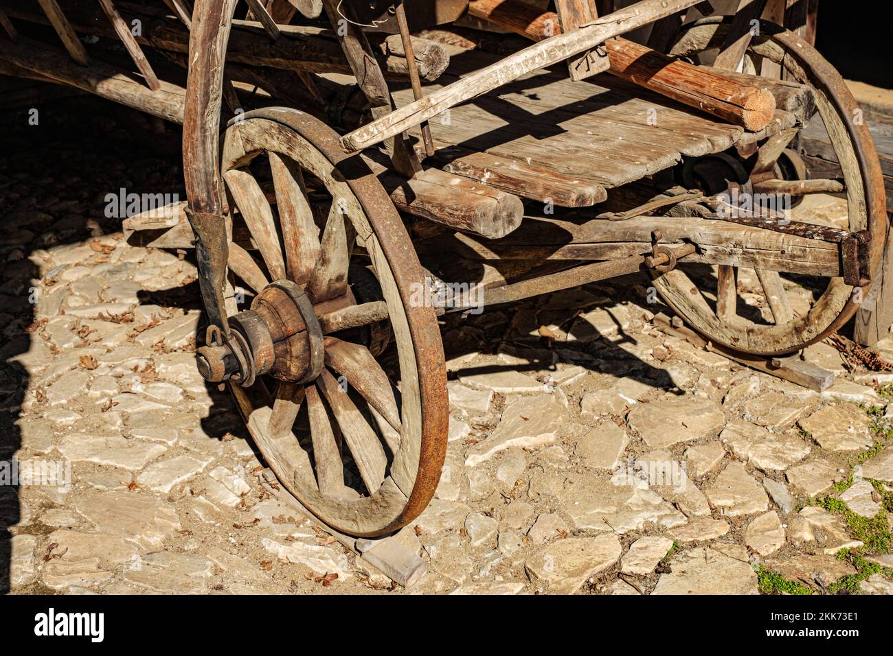 old Romanian carriage with rusty wheels Stock Photo - Alamy