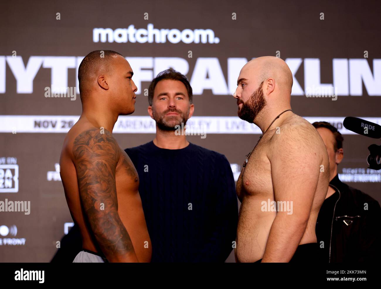 Boxing promoter Eddie Hearn (centre) stands between Fabio Wardley (left ...