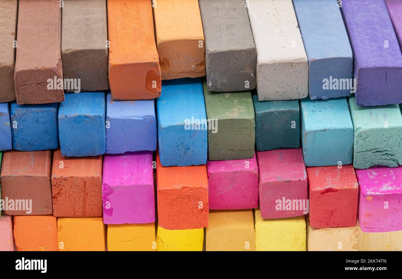Square colorful pastel chalks closeup, low level angle Stock Photo - Alamy