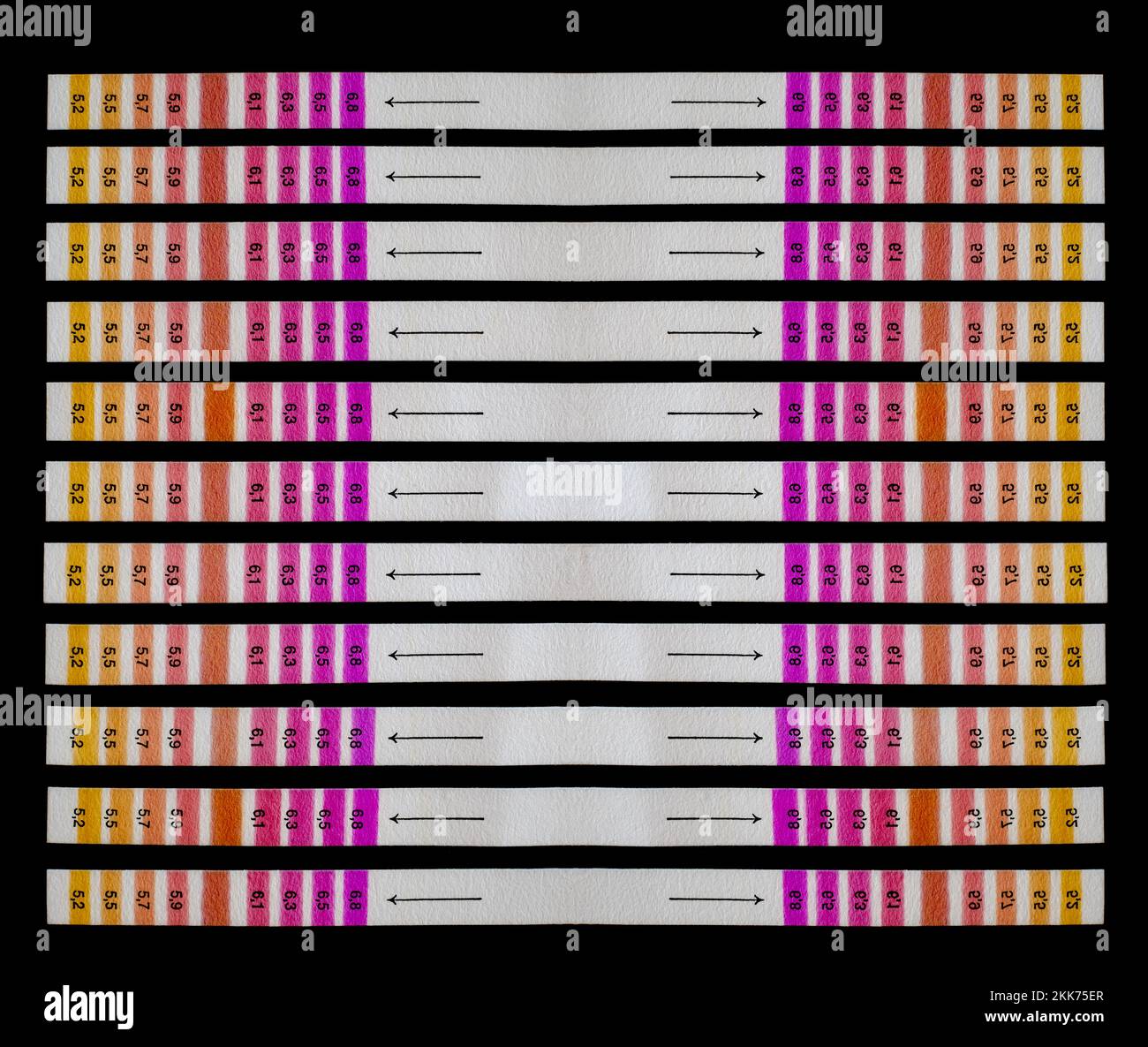 Test strips on black background Stock Photo - Alamy