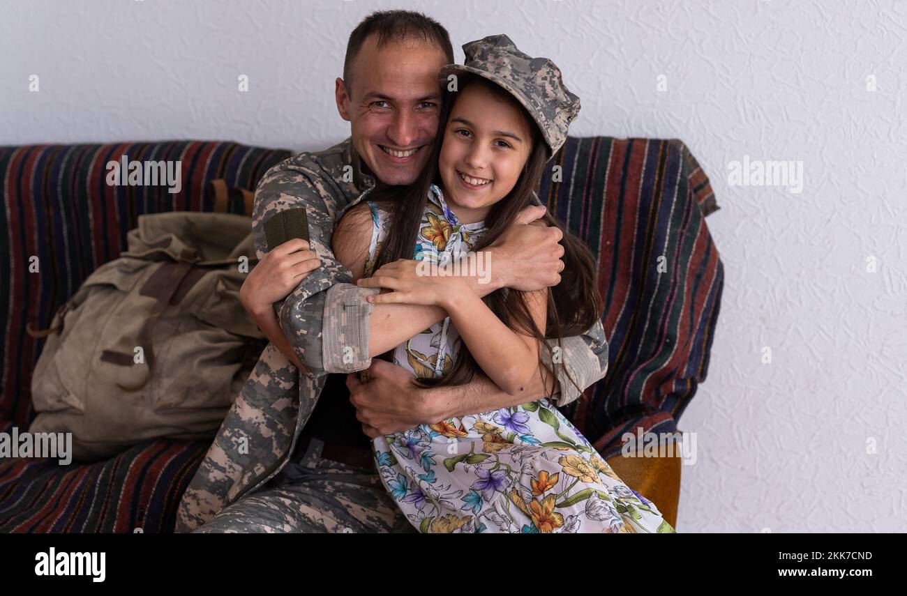Affectionate military father with daughter at home Stock Photo - Alamy