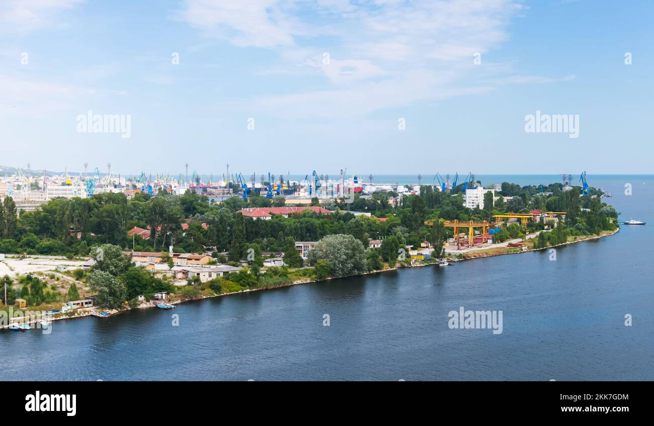 Port cranes and industrial buildings, aerial summer view of Varna ...