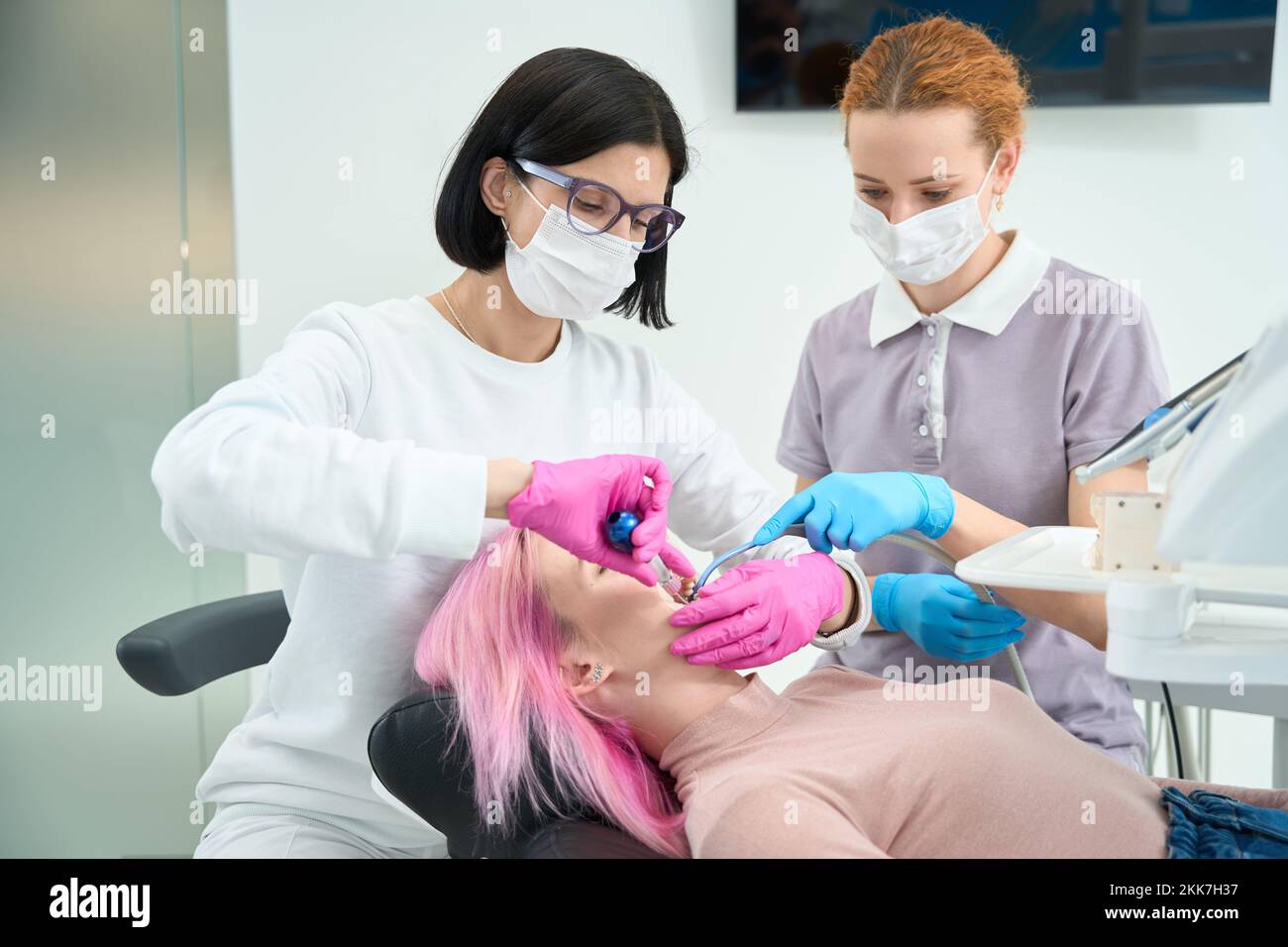 Dental procedure installing braces hi-res stock photography and images ...