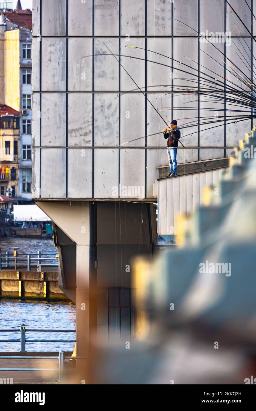 People fishing in Bosfor from Galata bridge in Istanbul Turkey Stock ...