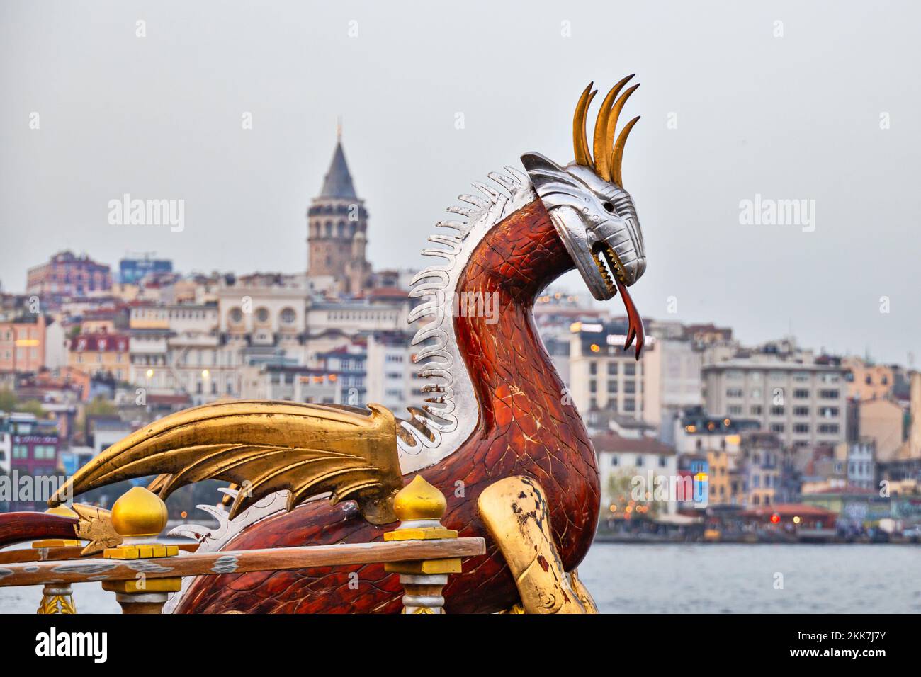 Colorful wooden dragon on a ship docked in Galata region of Istanbul ...
