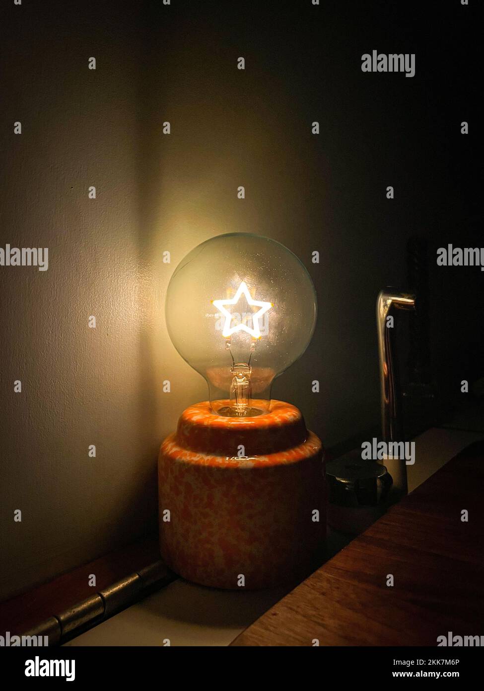 A star-shaped light in an old bulb Stock Photo - Alamy