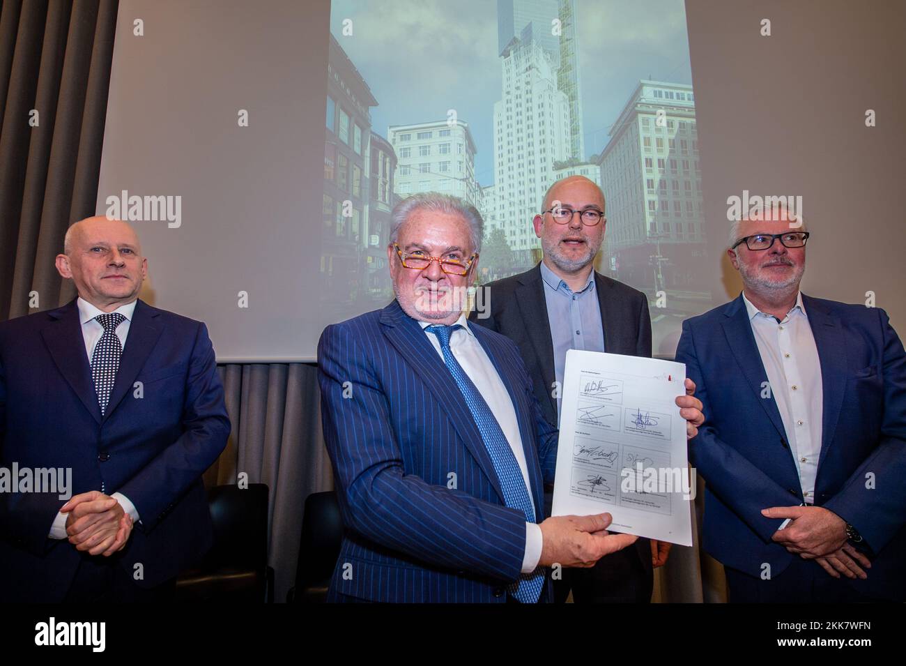 Katoen Natie CEO Fernand Huts (C), Architect Luc De Graef (R) and ...