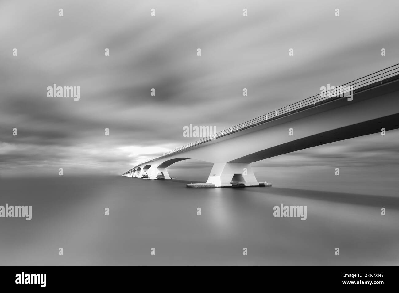 A low-angle view of a beautiful bridge above the lake in Zeelandbrug ...