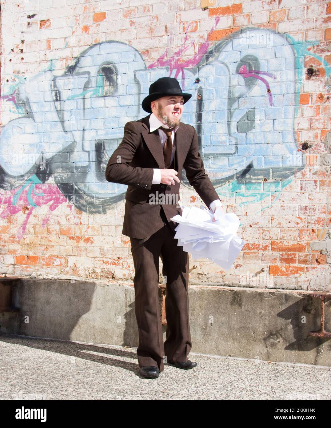 Retro Sniggering Salesman Sneers With A Smile While Holding Dodgy ...