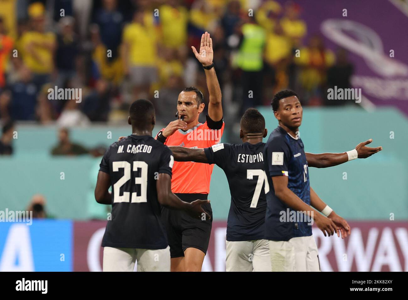 Doha, Qatar. 25th Nov, 2022. Referee Mustapha Ghorbal (2nd L) disallows ...