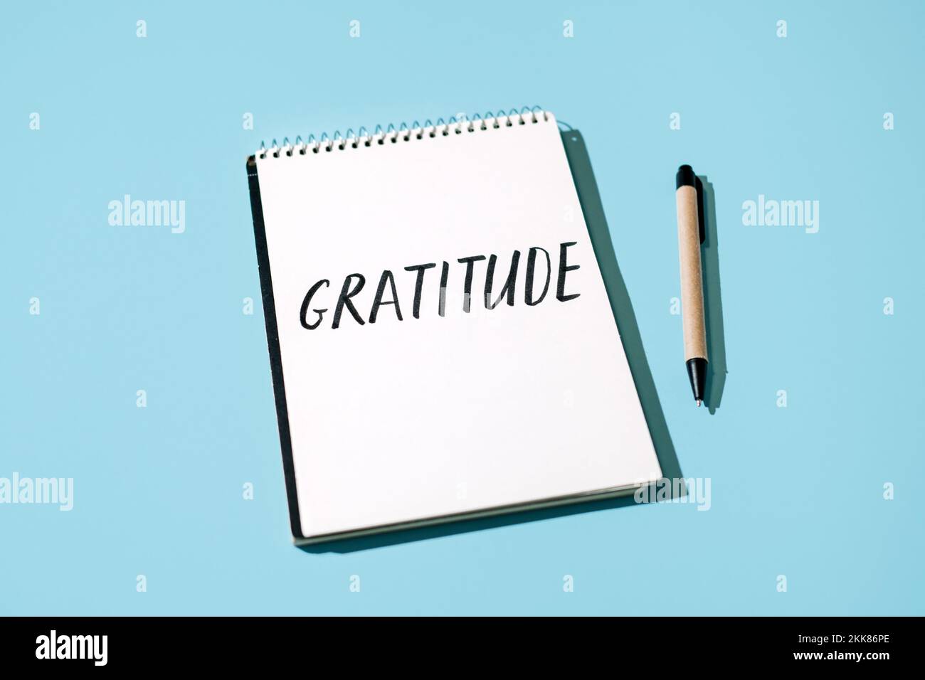 How to Practice Gratitude. Word Gratitude in open notebook on table ...