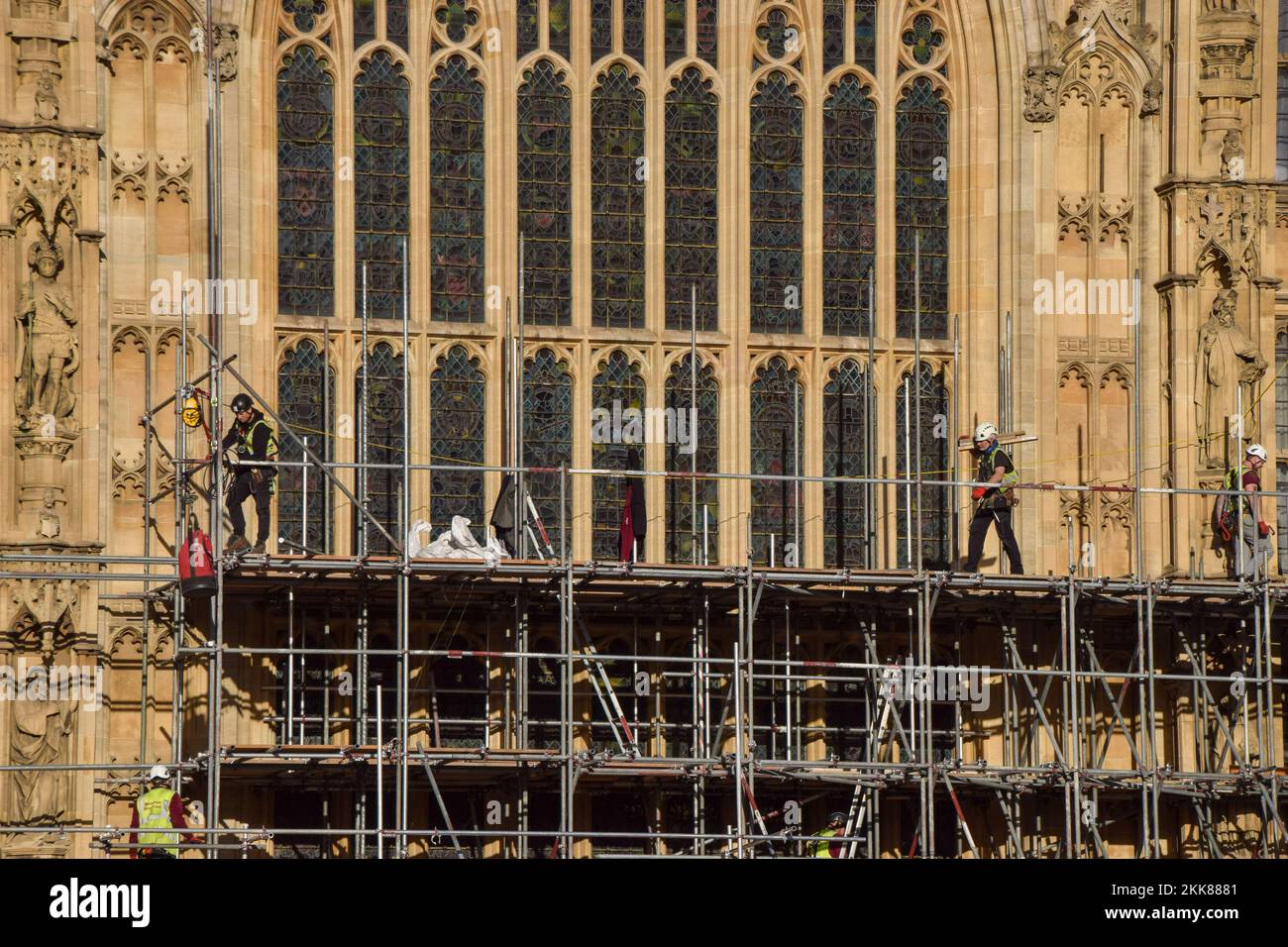 Workers remove the scaffolding from parts of the Palace of Westminster ...
