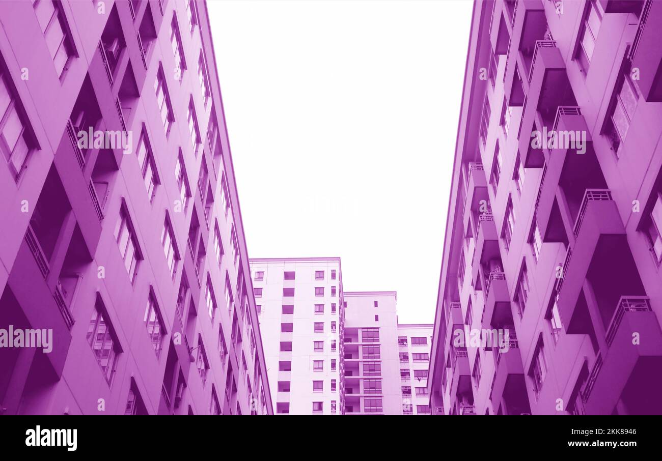 Low Angle View of Modern High Buildings in Purple Color Stock Photo - Alamy