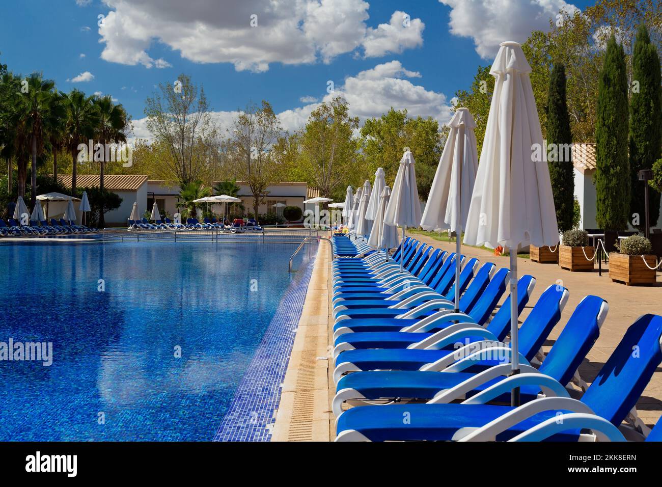 Empty sun loungers by the pool, hotel in Mallorca, Spain Stock Photo ...