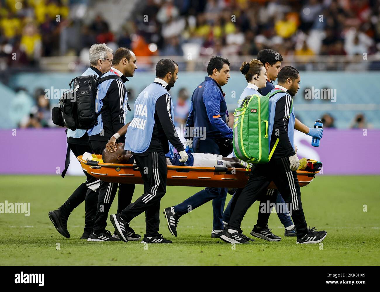 AL-RAYYAN - (LR) Piero Hincapie of Ecuador is carried off the pitch ...