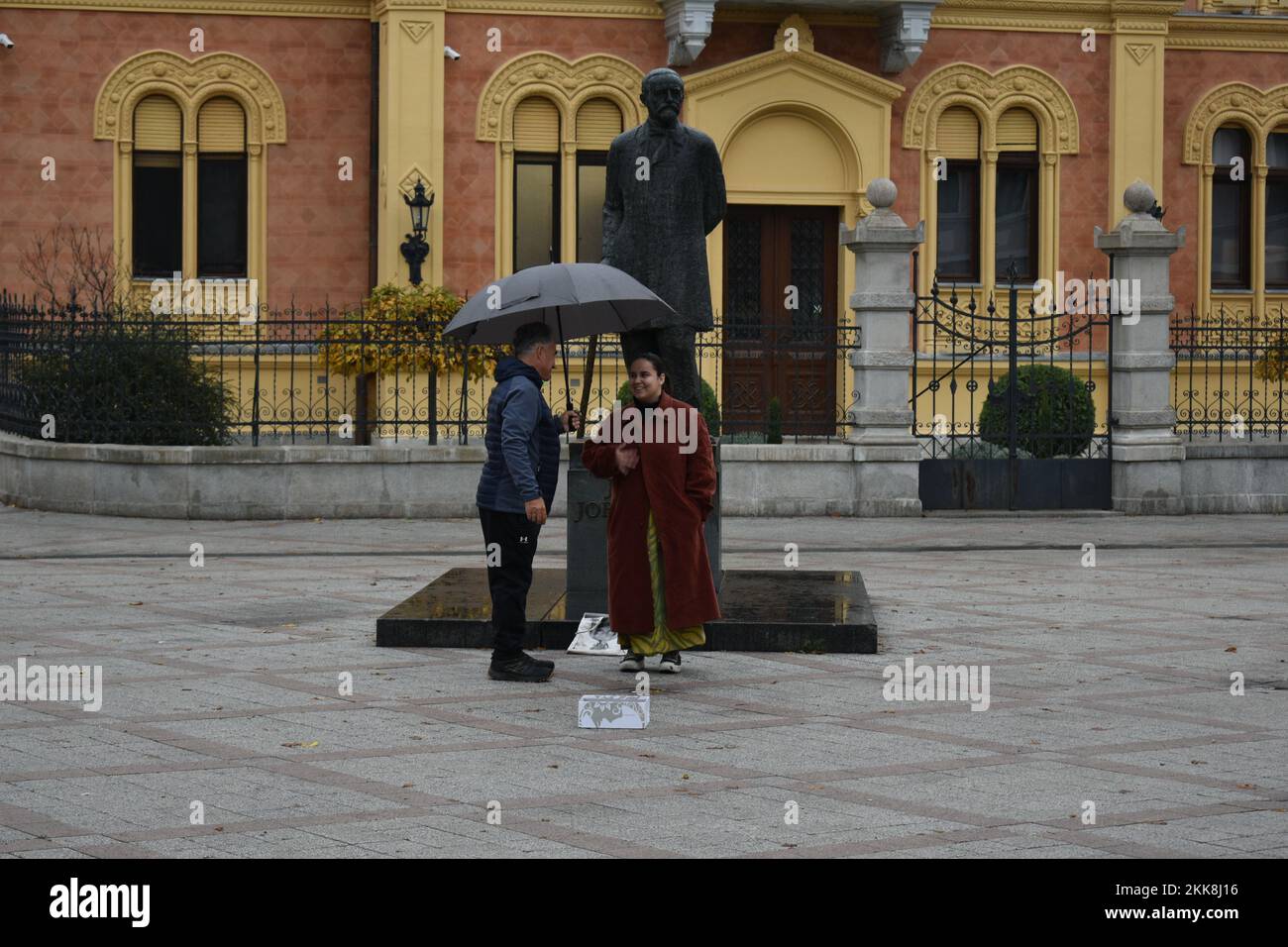 Street singer in Novi Sad singing Stock Photo - Alamy