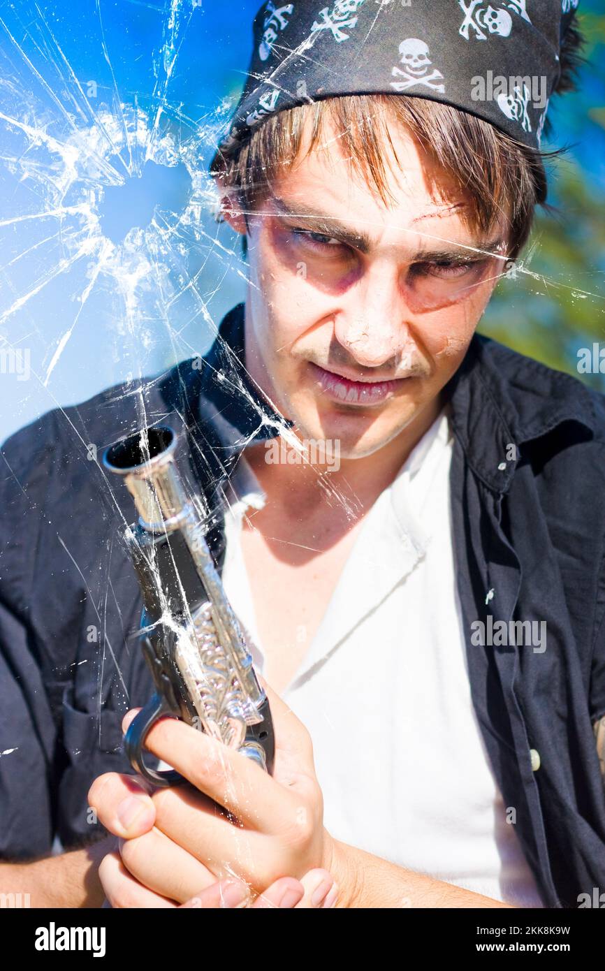 Break And Enter Concept Sees A Sinister And Deadly Burglar With Gun ...