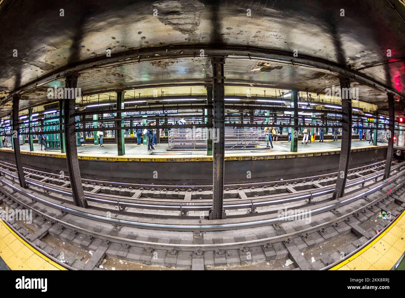 NEW YORK, USA - OCT 21 2015: People wait at subway station Wall street ...