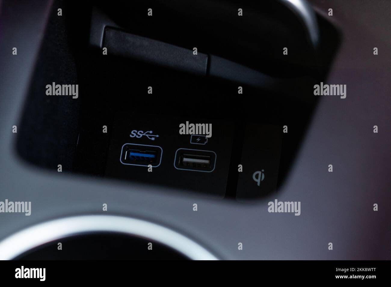 Opened car USB port in the car for connecting device. Power output of ...