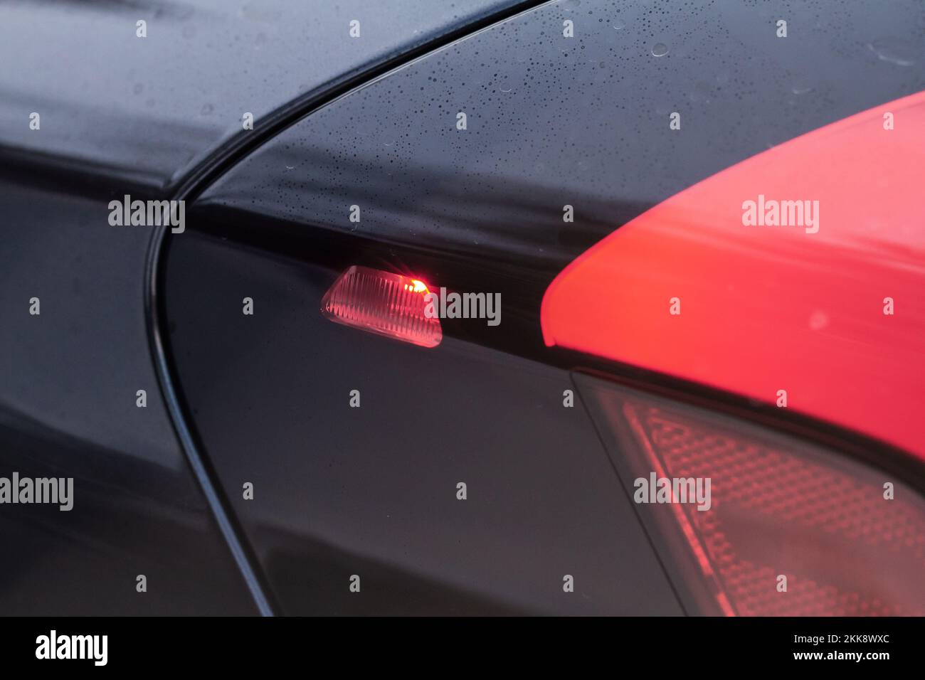Modern rear light of a car. Brake light and arrow of large suv. Rear ...