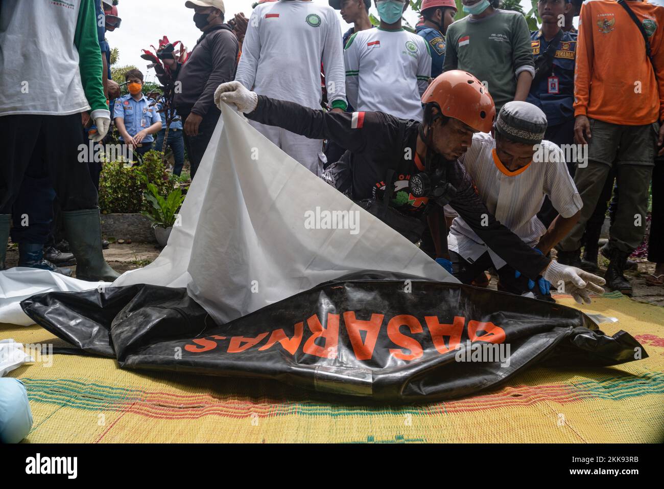 Cianjur, West Java, Indonesia. 25th Nov, 2022. People prepare a burial ...