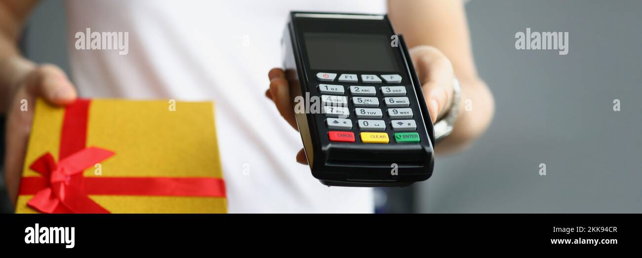 Man courier give credit card reader machine for cashless payment ...