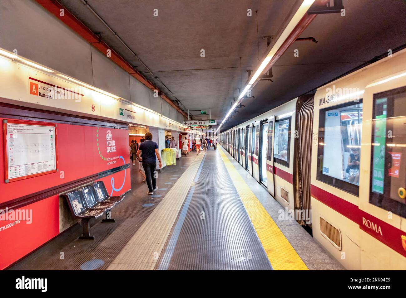 Rome, Italy - August 1, 2021: people in the train station Termini use ...