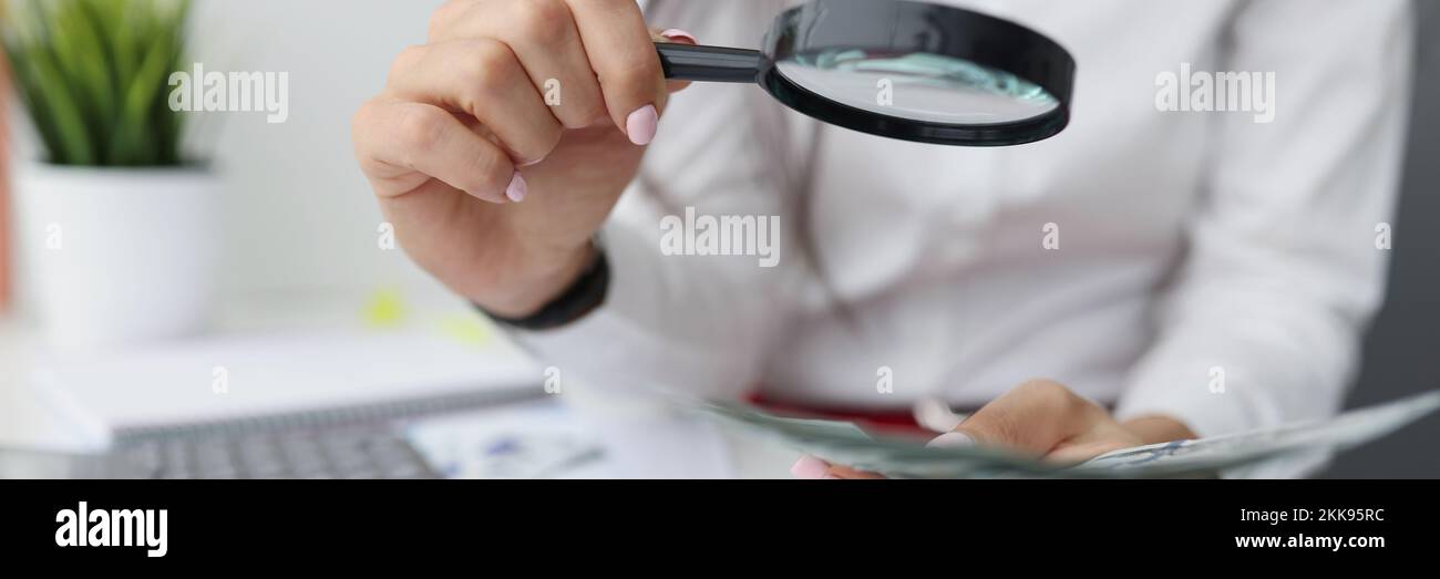 Female hold magnifying glass analyzing business financial data, manager ...