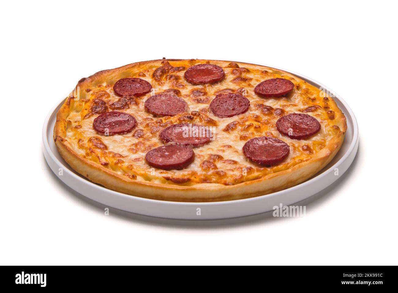 A delicious pepperoni pizza on white plate isolated on white background ...