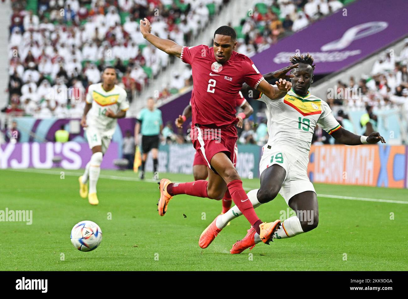 Pedro Miguel of Qatar and Famara Diedhiou of Senegal during Qatar v Senegal match of the Fifa ...