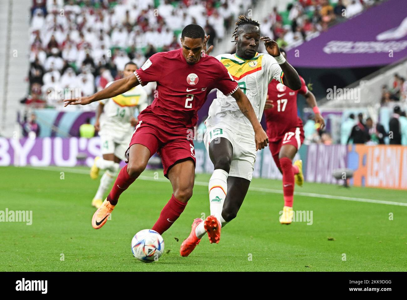 Pedro Miguel of Qatar and Famara Diedhiou of Senegal during Qatar v ...