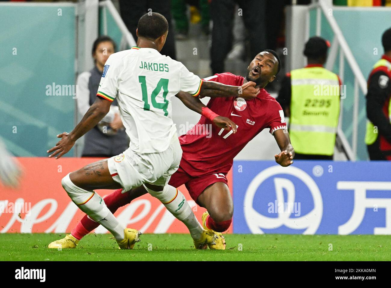 Moustapha Name of Senegal and Ismaeel Mohammad of Qatar during Qatar v ...