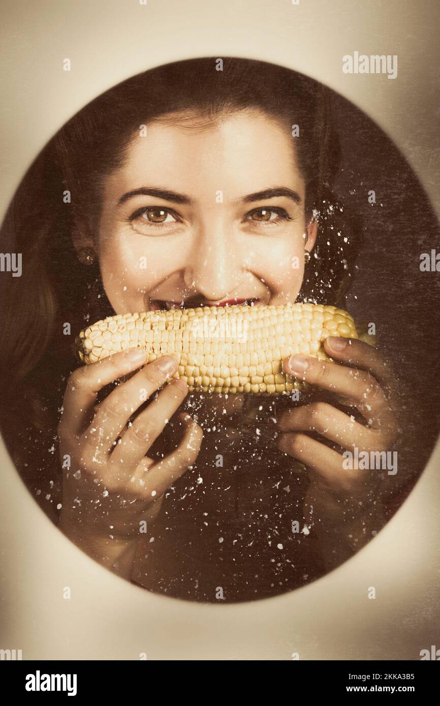 Old Funny Pin Up Portrait With Circle Frame Copy Space Of A Happy Young Girl Eating Corn Cob