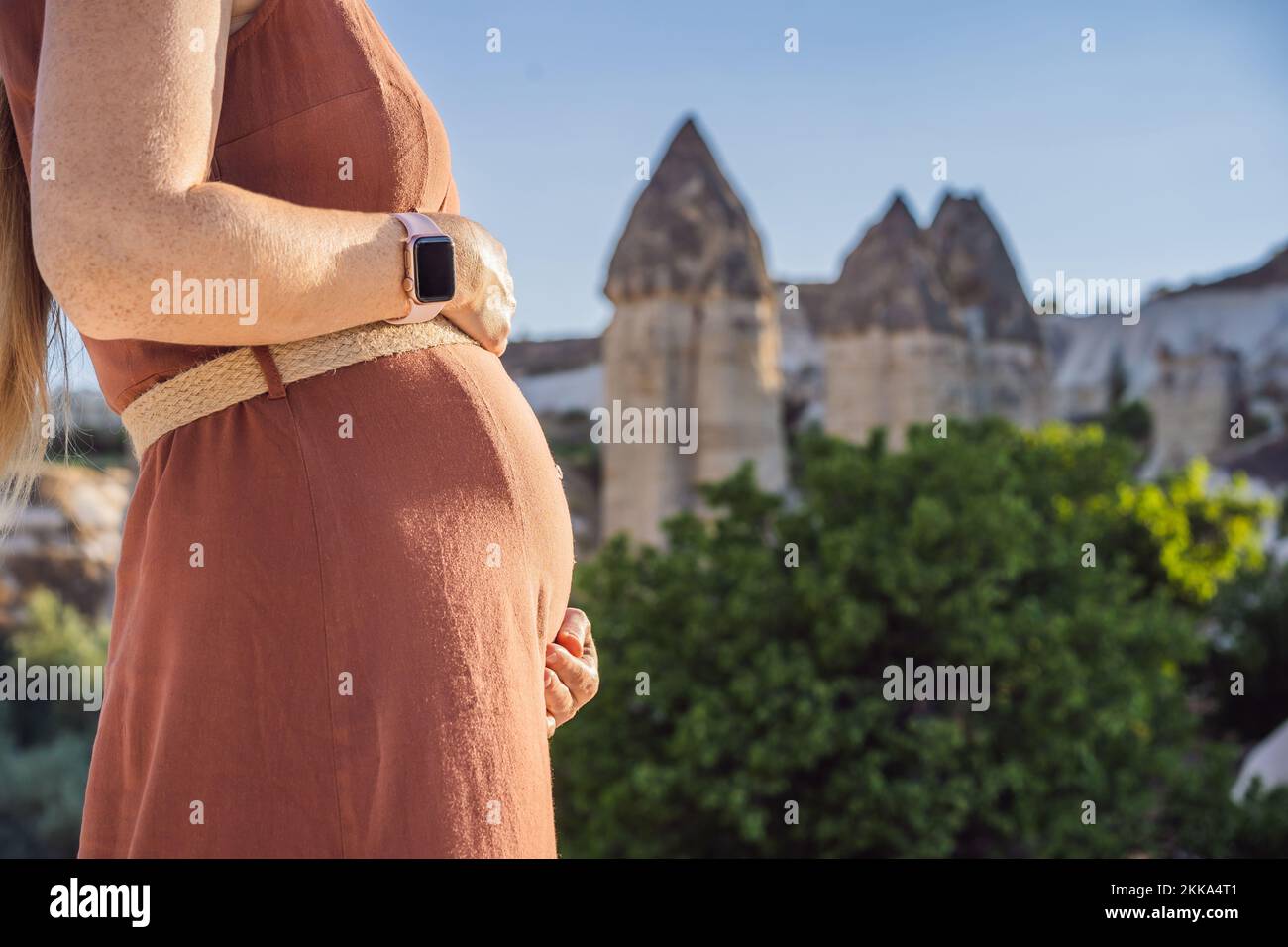 Pregnant woman on background of Unique geological formations in Love ...