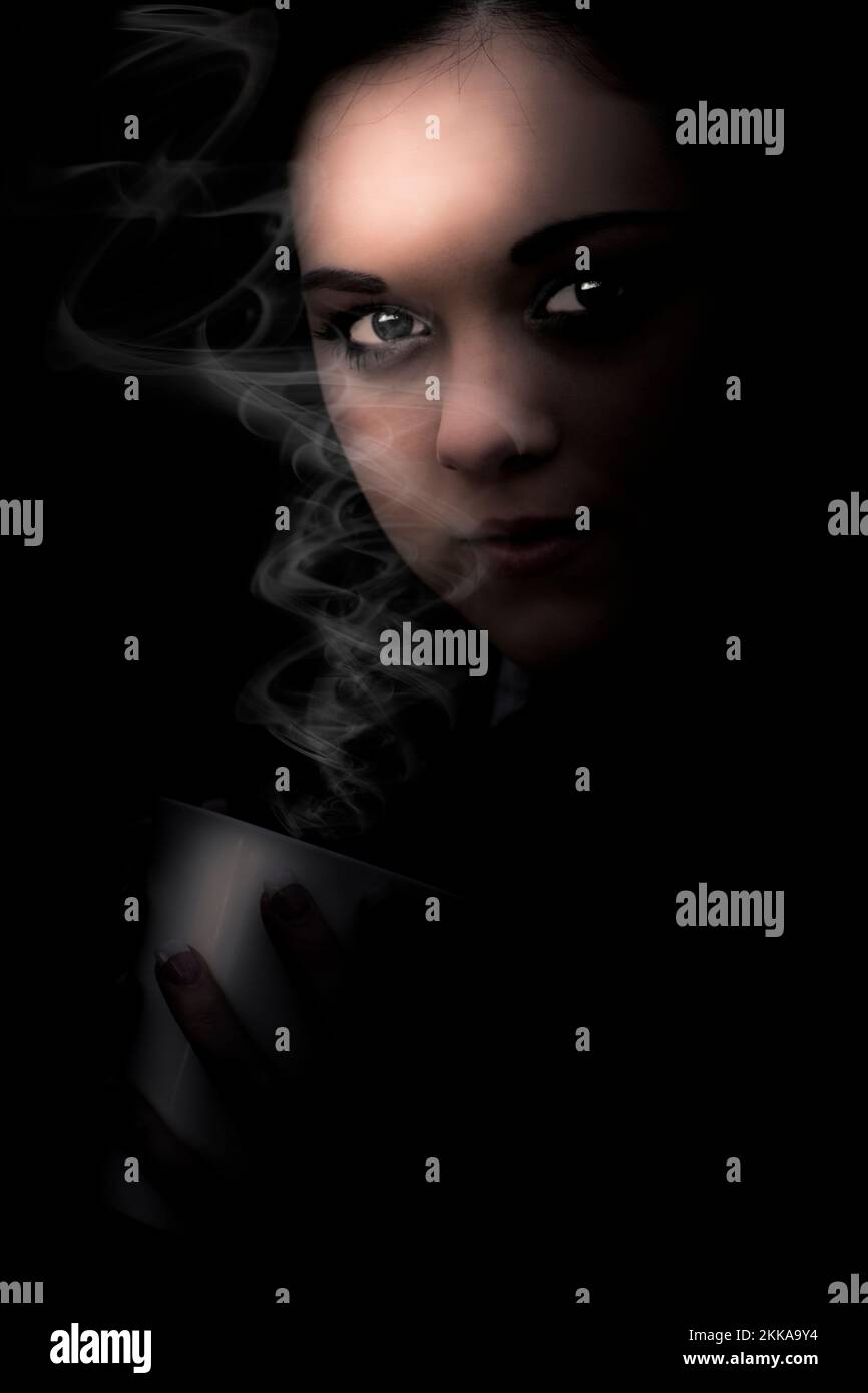 Face Of A Dark Female Figure Standing In The Dimly Lit Darkness With A ...