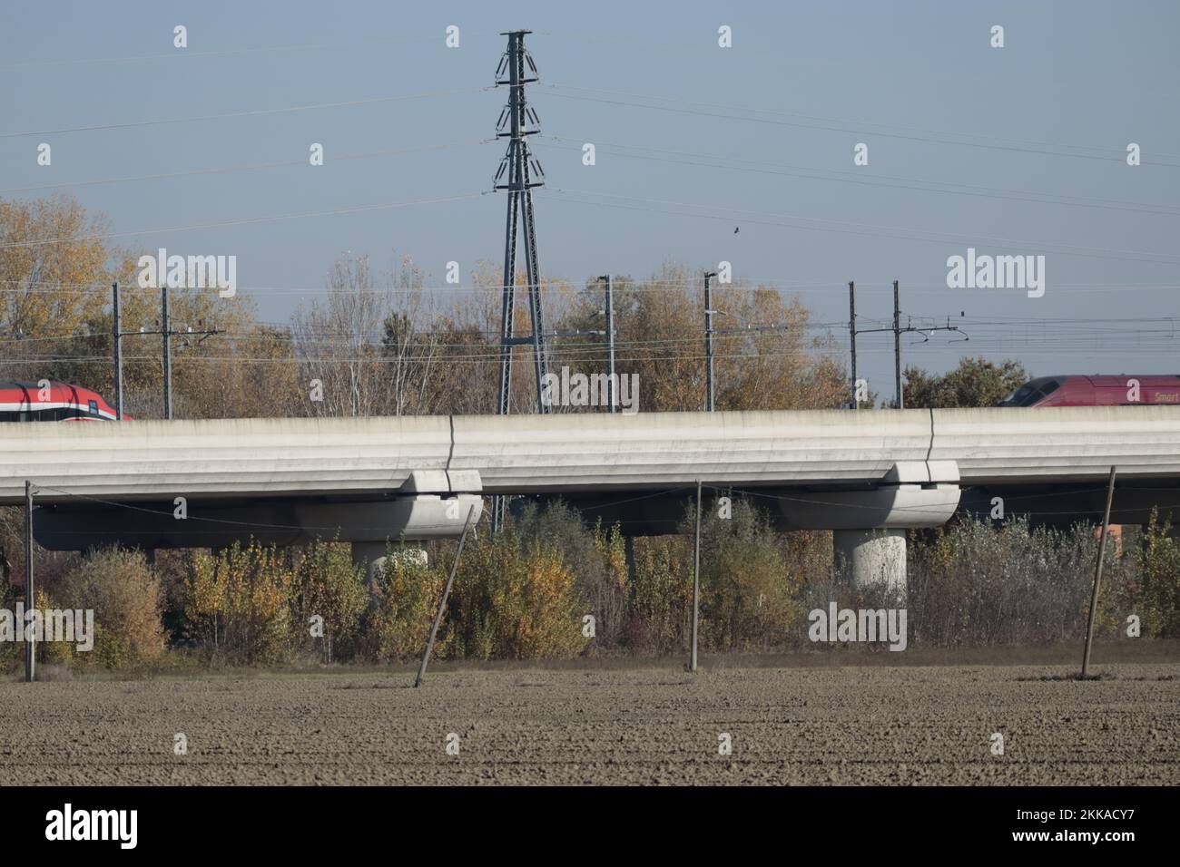 Trains about to cross on the high speed line Stock Photo - Alamy