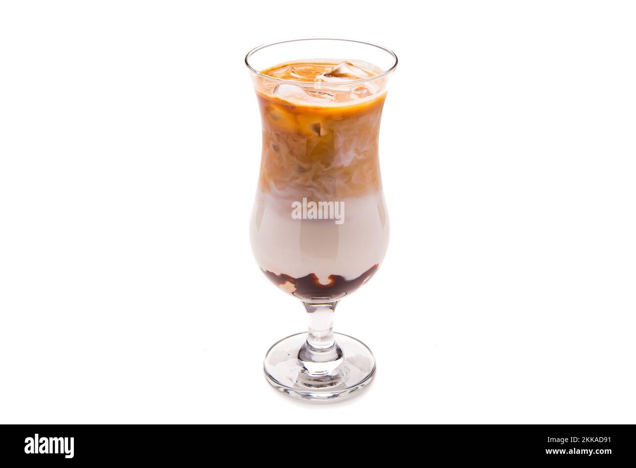 An iced coffee inside a glass cup on a white background Stock Photo - Alamy