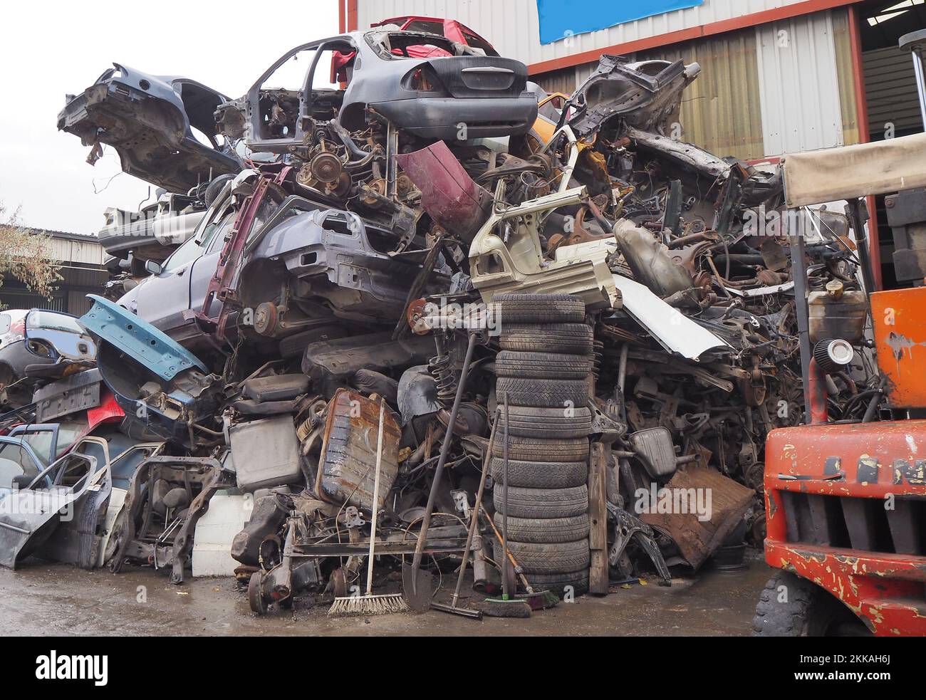 Stacked up vehicles and parts of cars Stock Photo - Alamy