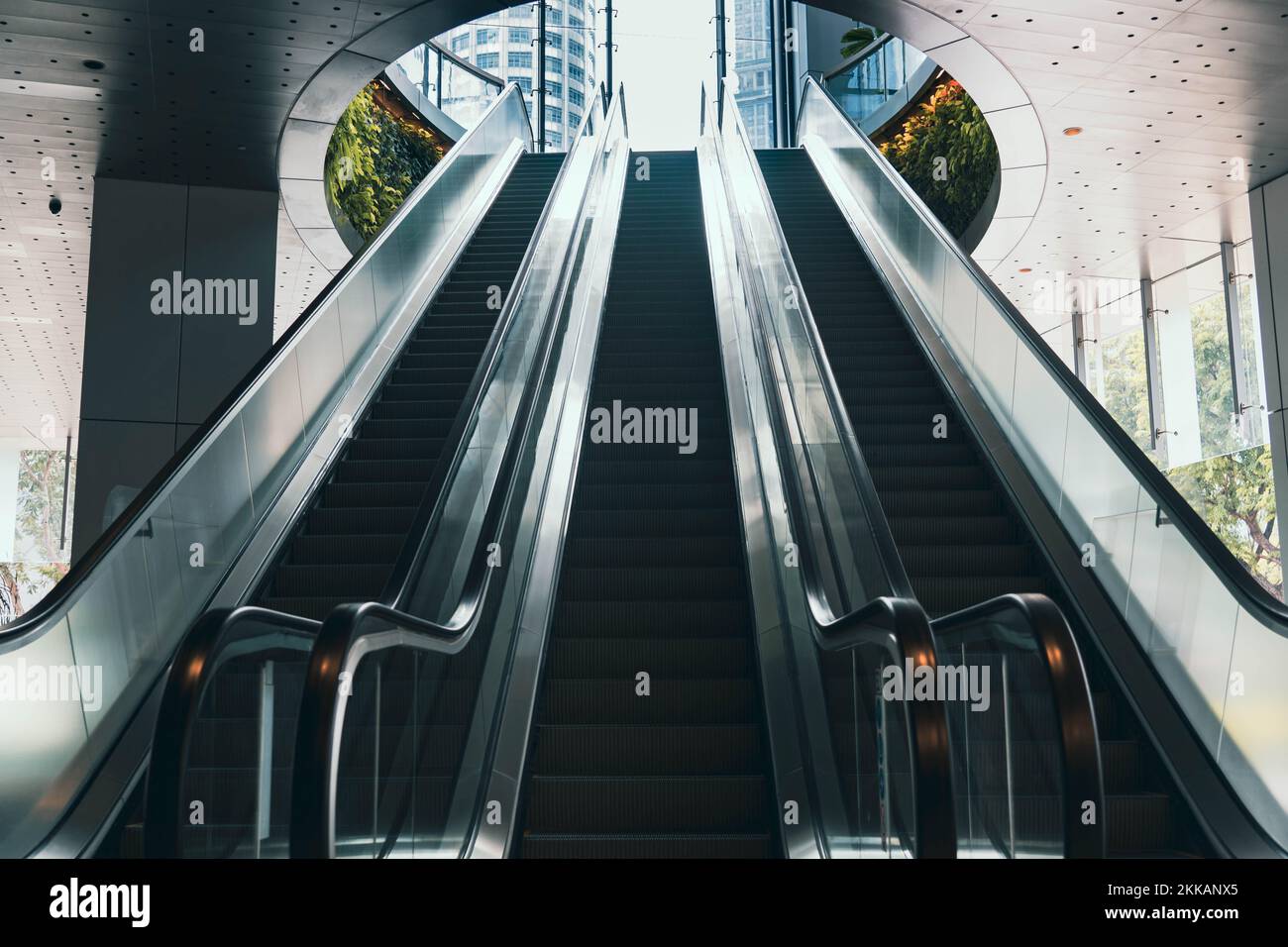 An underground modern escalator leading to the city Stock Photo - Alamy