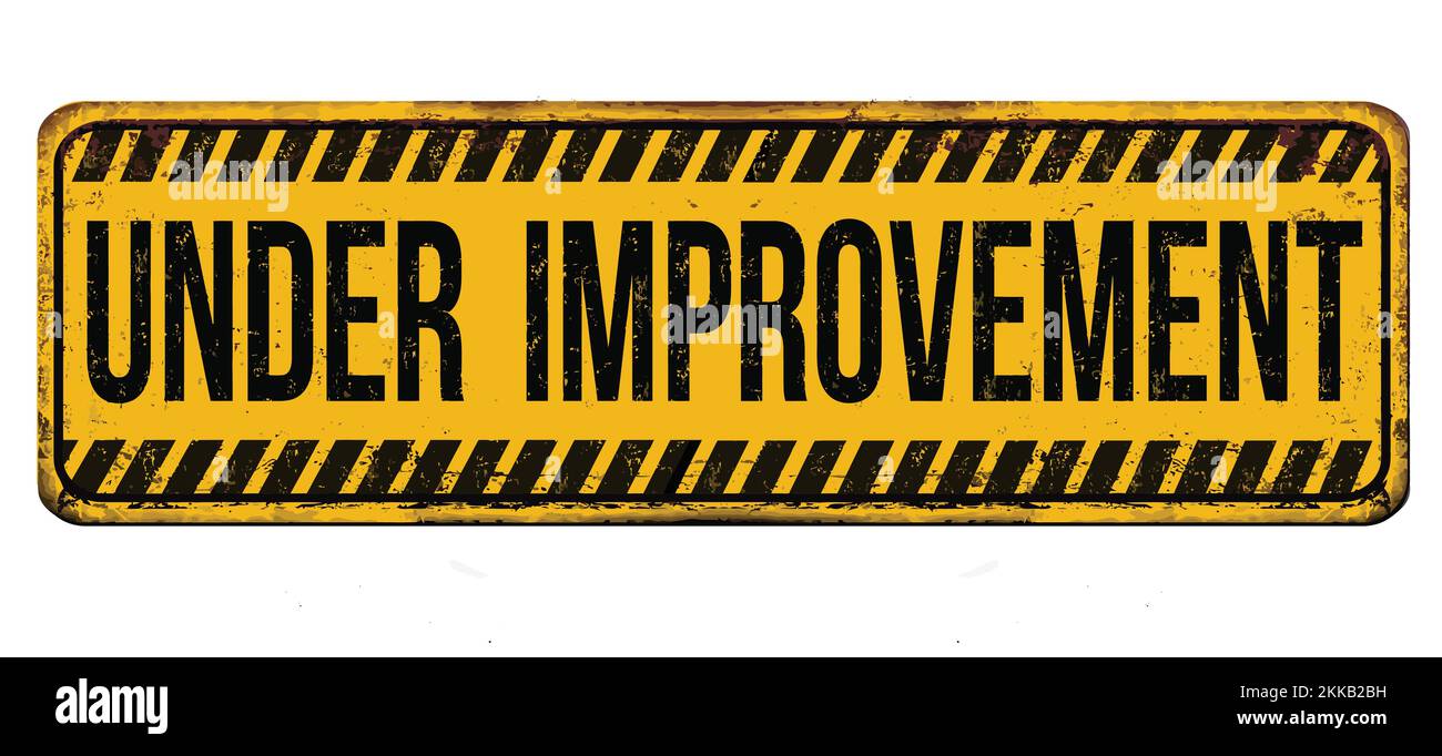 Under improvement vintage rusty metal sign on a white background ...