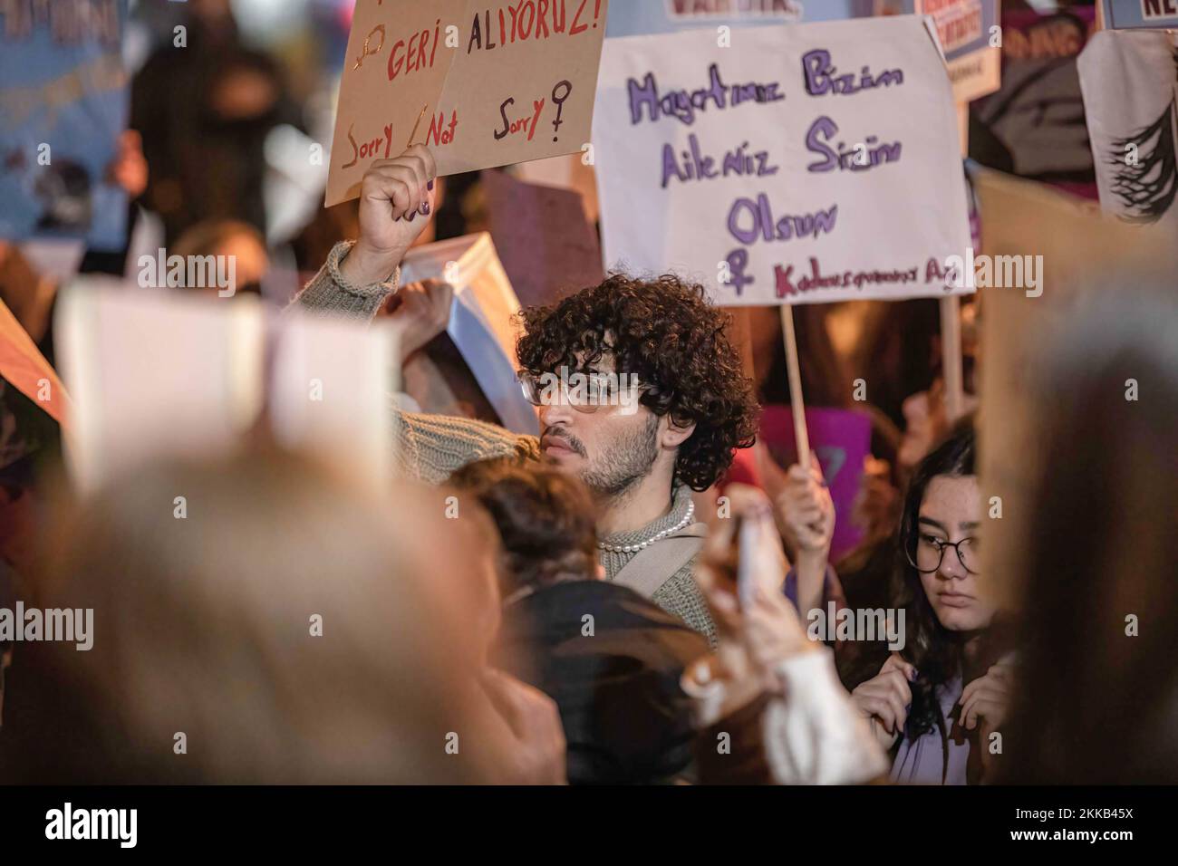 A protester holds a placard expressing opinion during the demonstration ...
