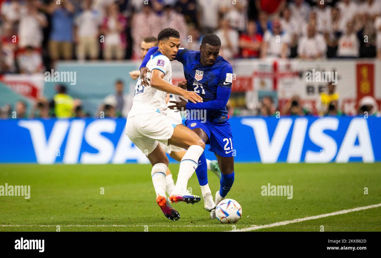 Doha, Qatar. 25th Nov, 2022. Jude Bellingham (England), Timothy Weah ...