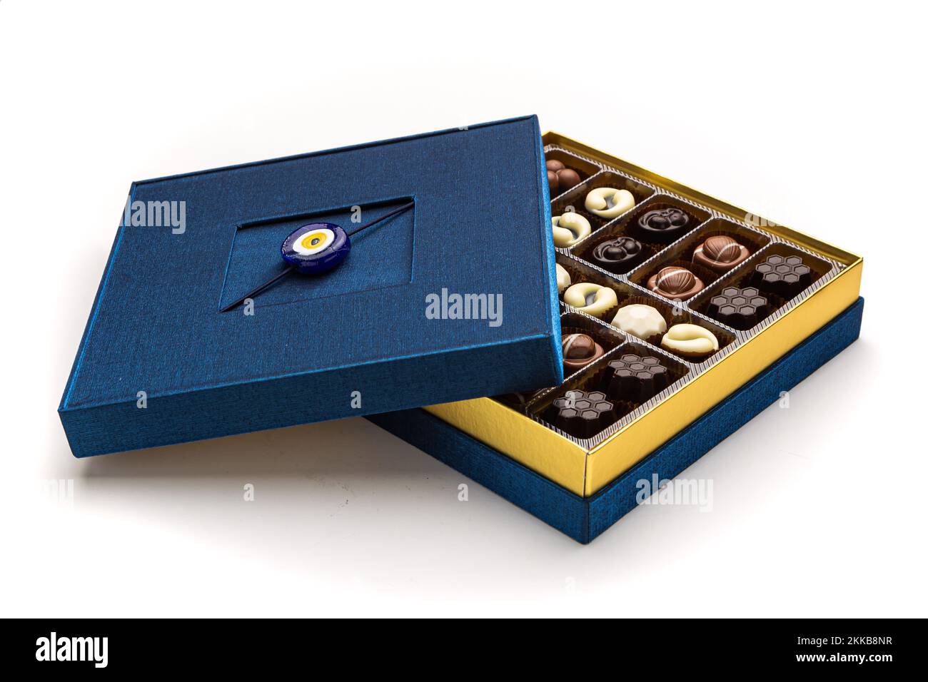 A chocolate variety in a blue box isolated on white background Stock ...
