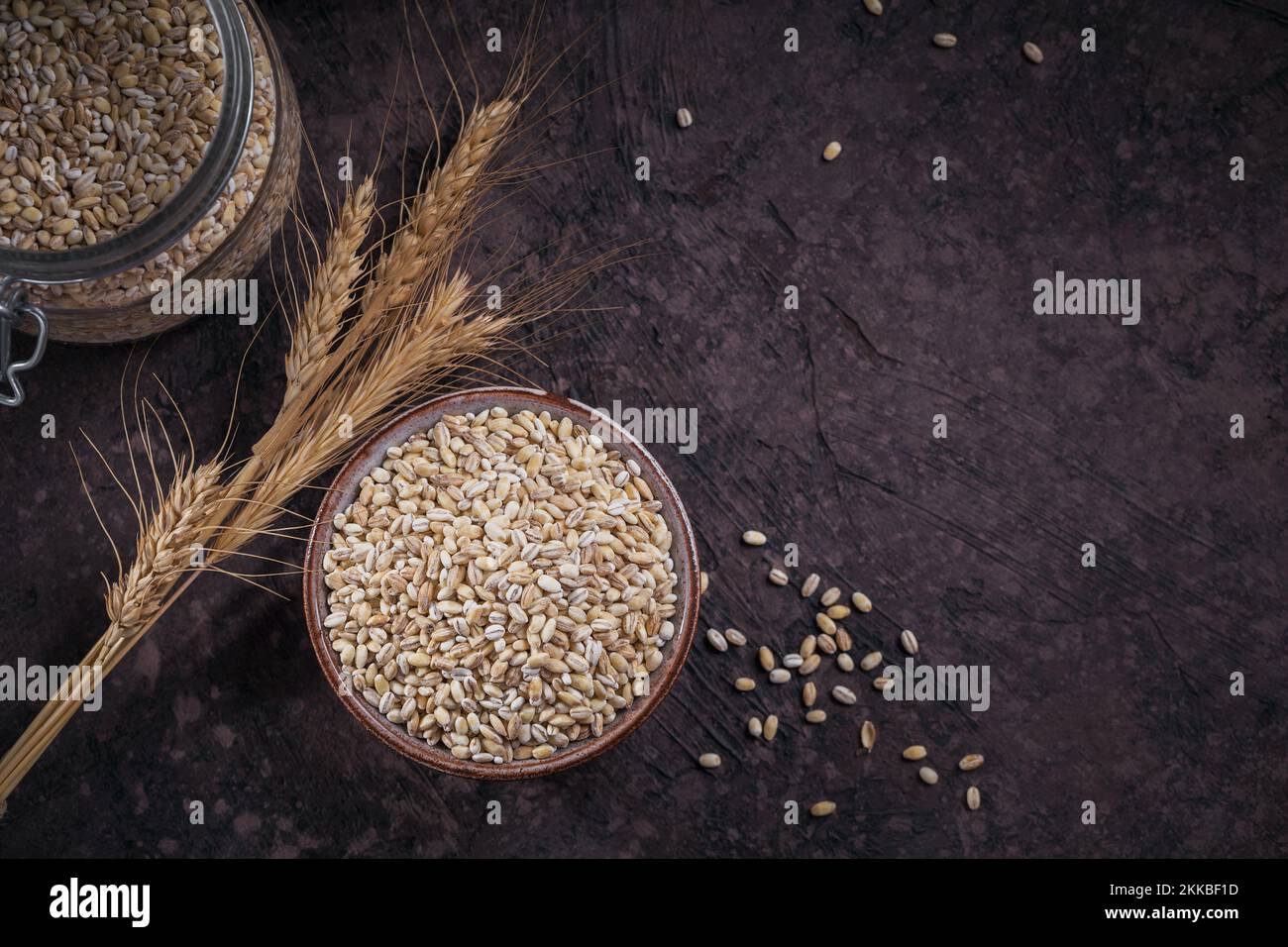 Bowl of raw dried broken pearl barley cereal grain Stock Photo - Alamy
